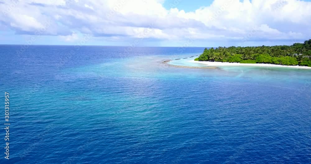 Paradise Of A Blue Deep Ocean Surrounding The Lush Green Island ...