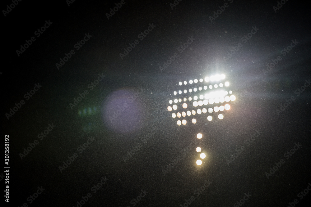 spotlights in the stadium by dark with rain Stock Photo | Adobe Stock