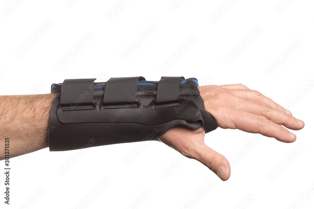 human hand with a wrist brace, orthopedic equipment isolated on white ...