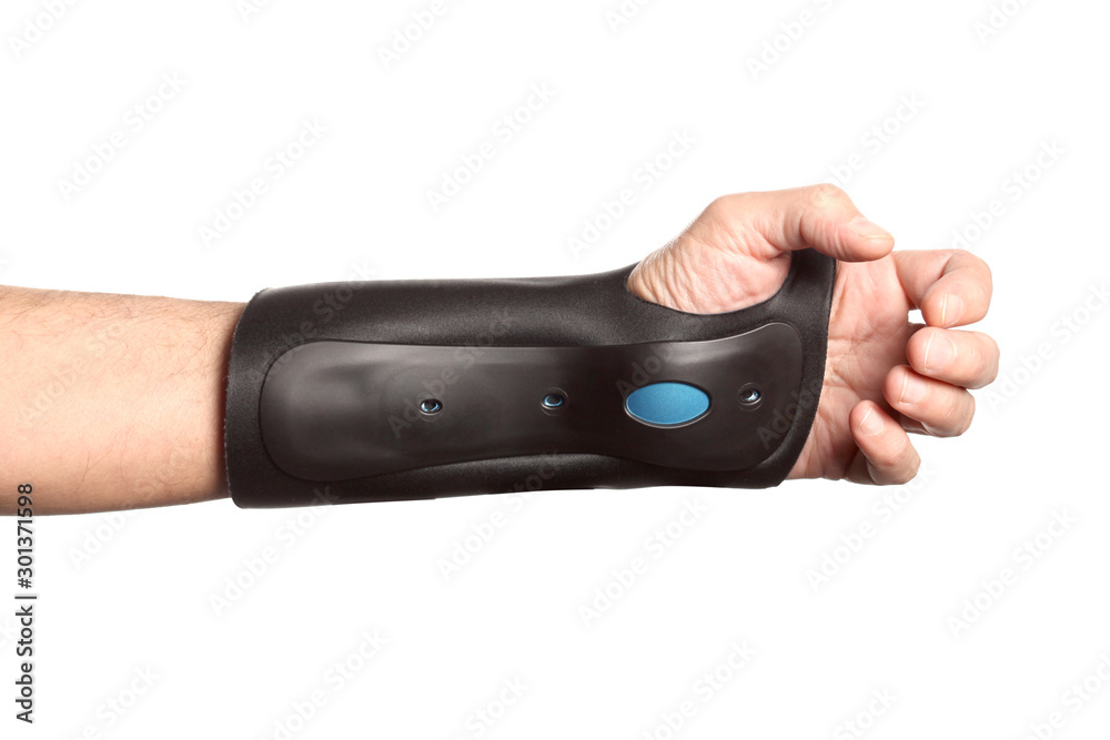 human hand with a wrist brace, orthopedic equipment isolated on white ...