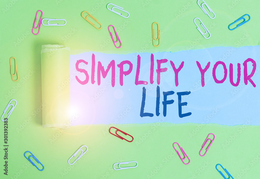 Writing note showing Simplify Your Life. Business concept for Manage ...