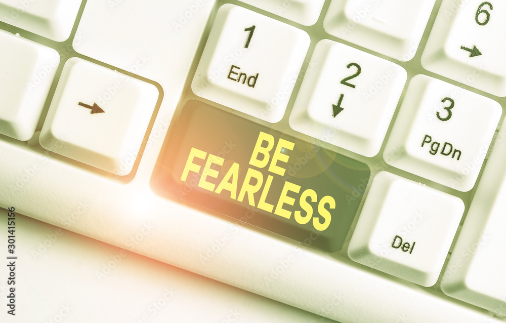 Writing note showing Be Fearless. Business concept for act of living in ...