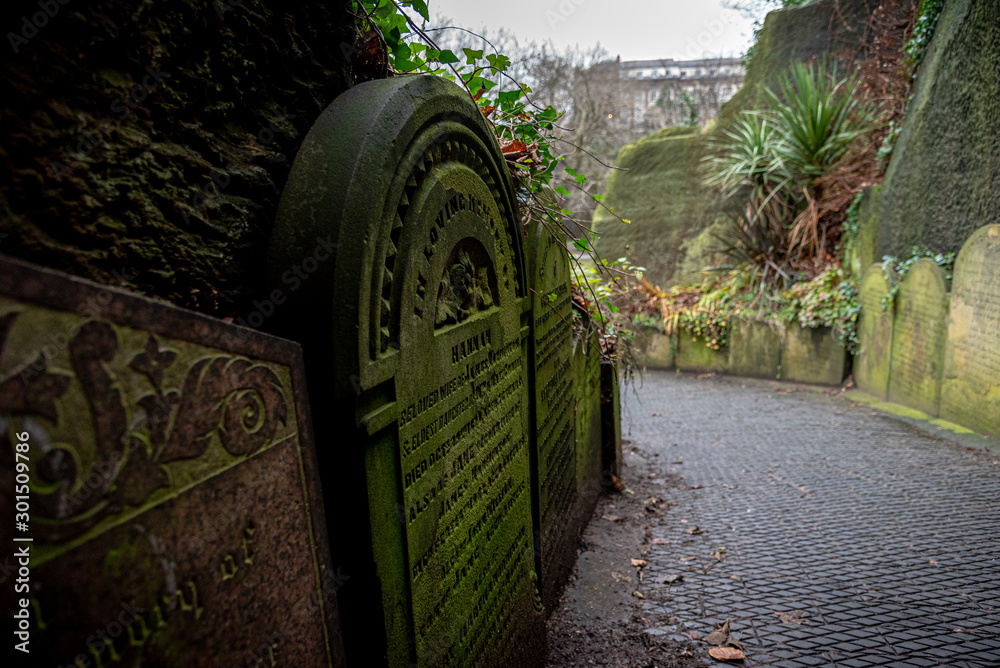 LIVERPOOL, ENGLAND, DECEMBER 27, 2018: Part of the path of gravestones ...