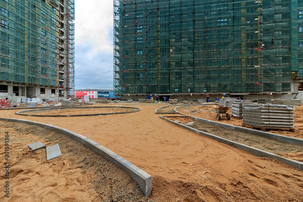 tile on sidewalk in courtyard of residential building under ...