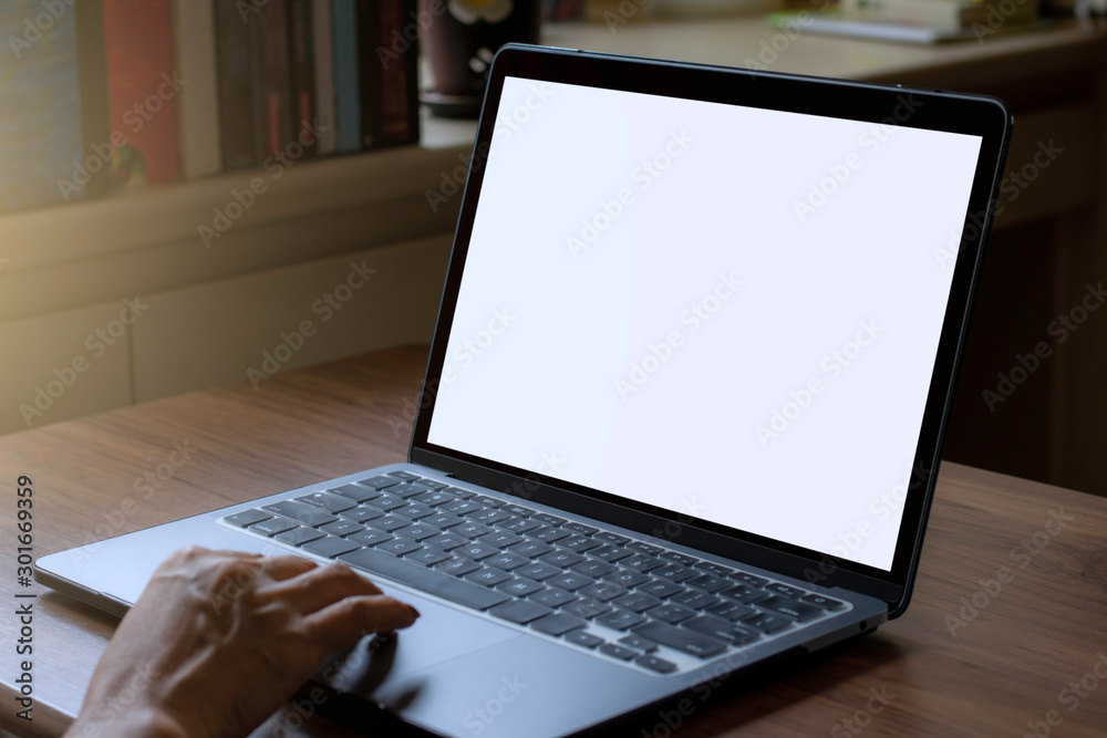 Mockup image of woman hand touching on laptop computer with blank white ...