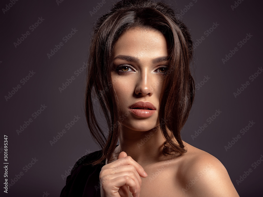 Beautiful woman with brown hair. Attractive model with brown eyes ...