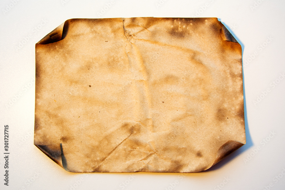 Burnt paper texture. Old crushed paper with the burned curved edges ...