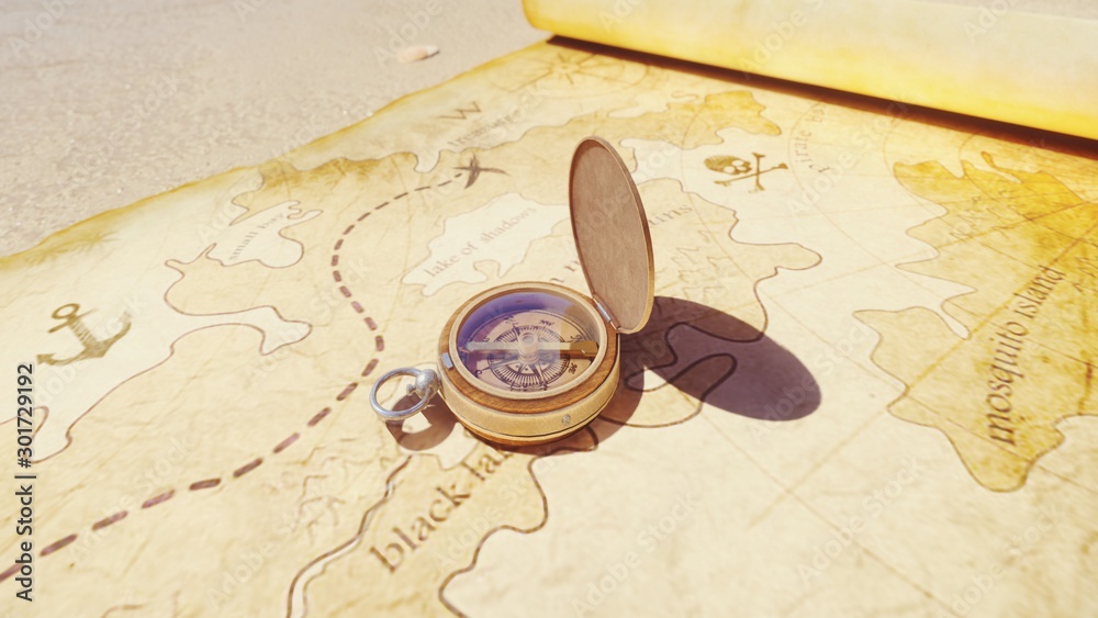 Pirate compass on the Treasure Map lying on the sand on the island of ...