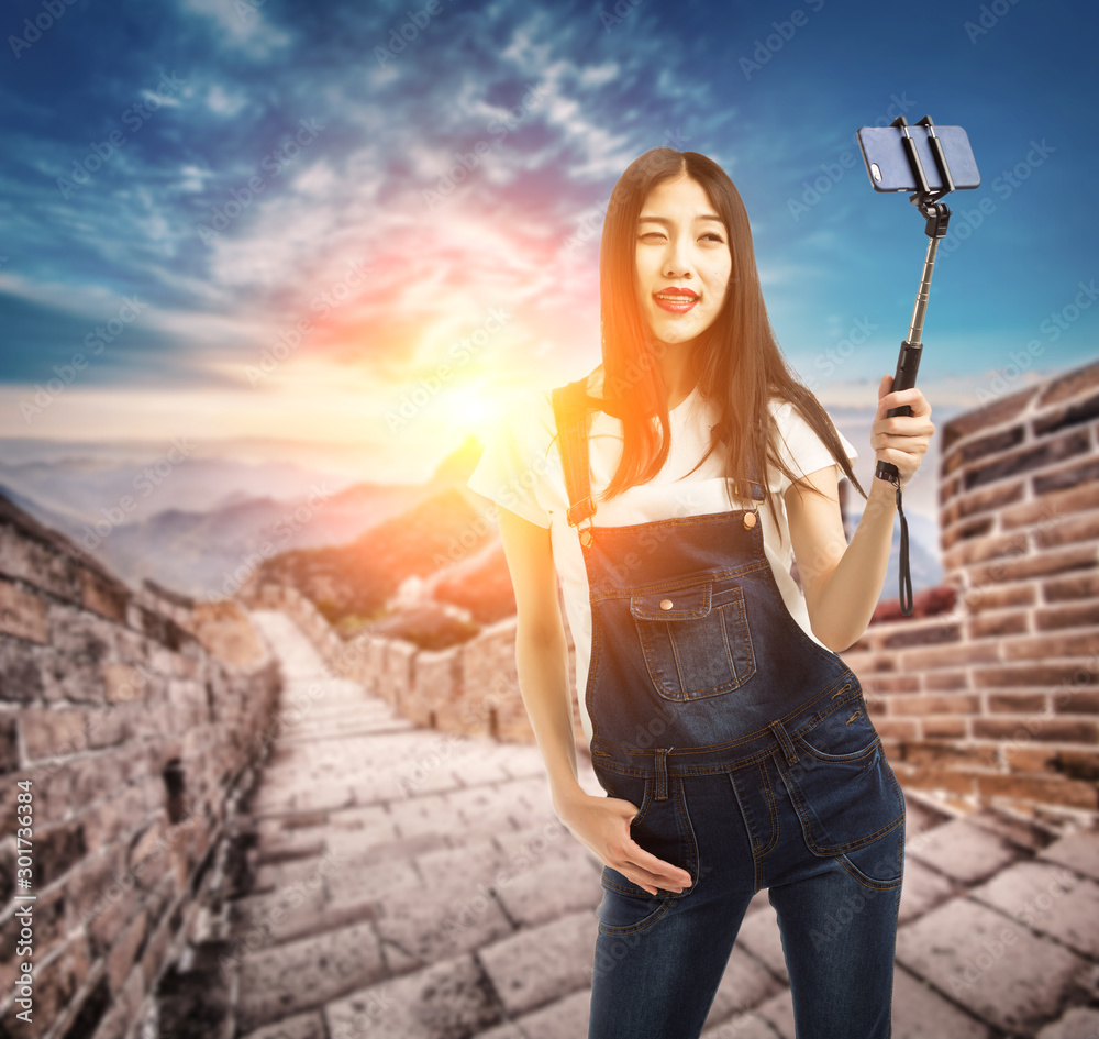 Selfie. Tourist at Great Wall of China excited and happy having fun at ...