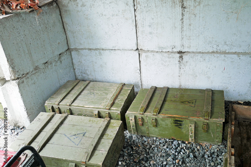 green wooden boxes of ammunition and bombs in bunker Stock Photo ...