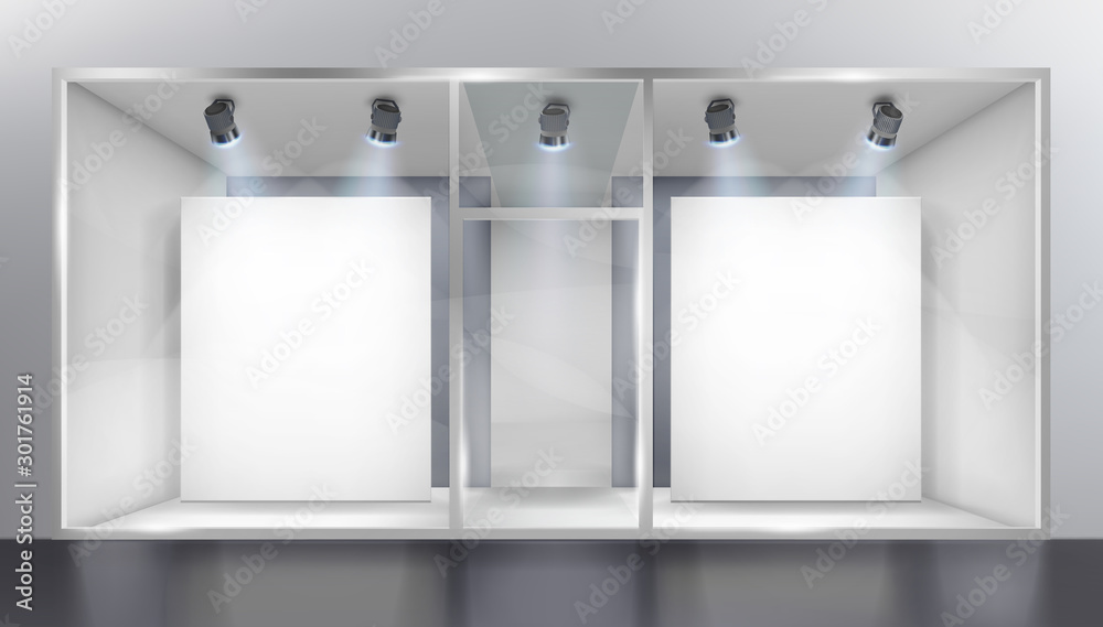 Illuminated shop window with spotlights in the mall. Place for the ...