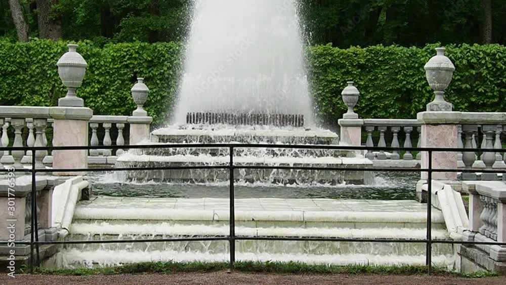 Beautiful garden with fountains on the geen background. Backdrop for ...