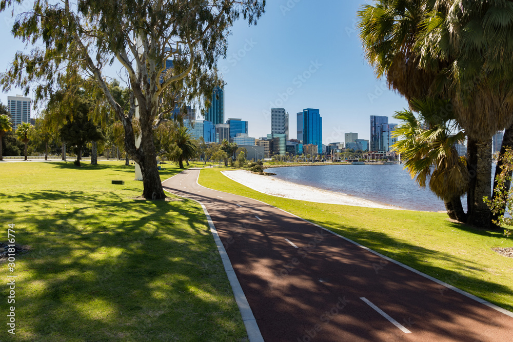 Trees and grass on the shores of the Swan River in Perth, Western ...