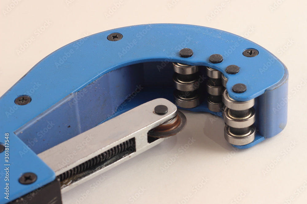 Roller pipe cutter bearings mechanism and ajustable knife close up ...