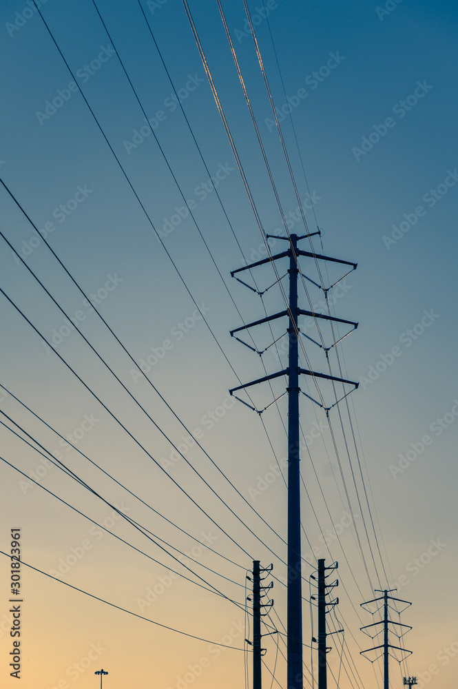 Urban electrical transmission lines and towers Stock Photo | Adobe Stock