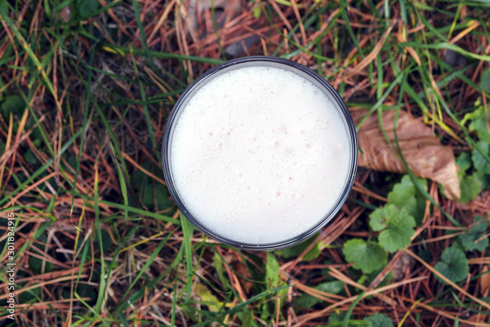 Oxygen foam in a glass beaker. An oxygen cocktail is a drink rich in ...