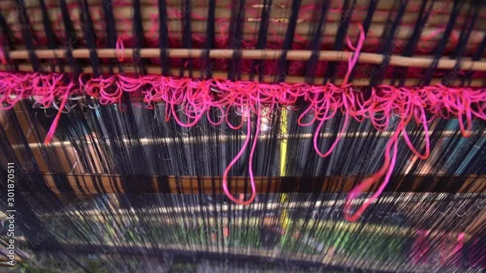 Traditional Sasak woman weaving Tenun Songket. Making Tenun Songket of ...