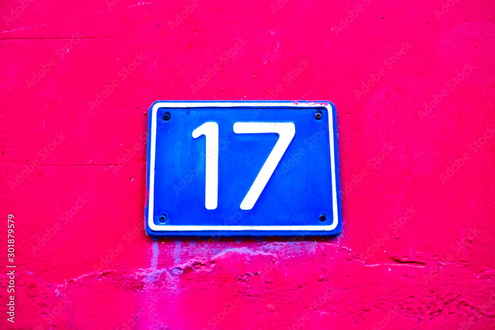 Number seventeen, 17, blue plate on neon red background. Stock Photo ...