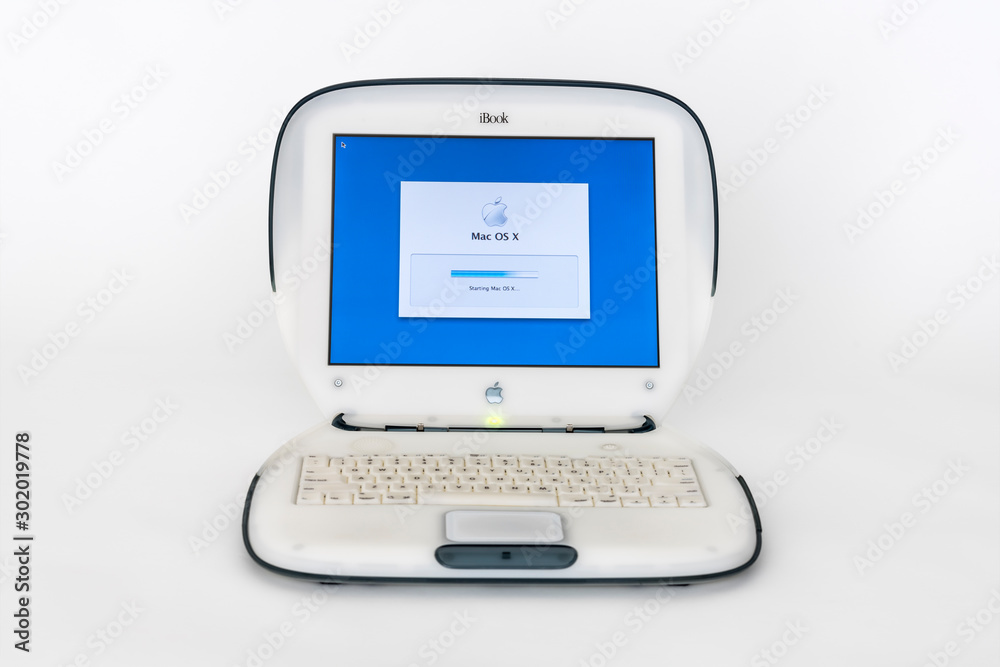 Illustrative editorial photo of old Apple clamshell style iBook laptop ...