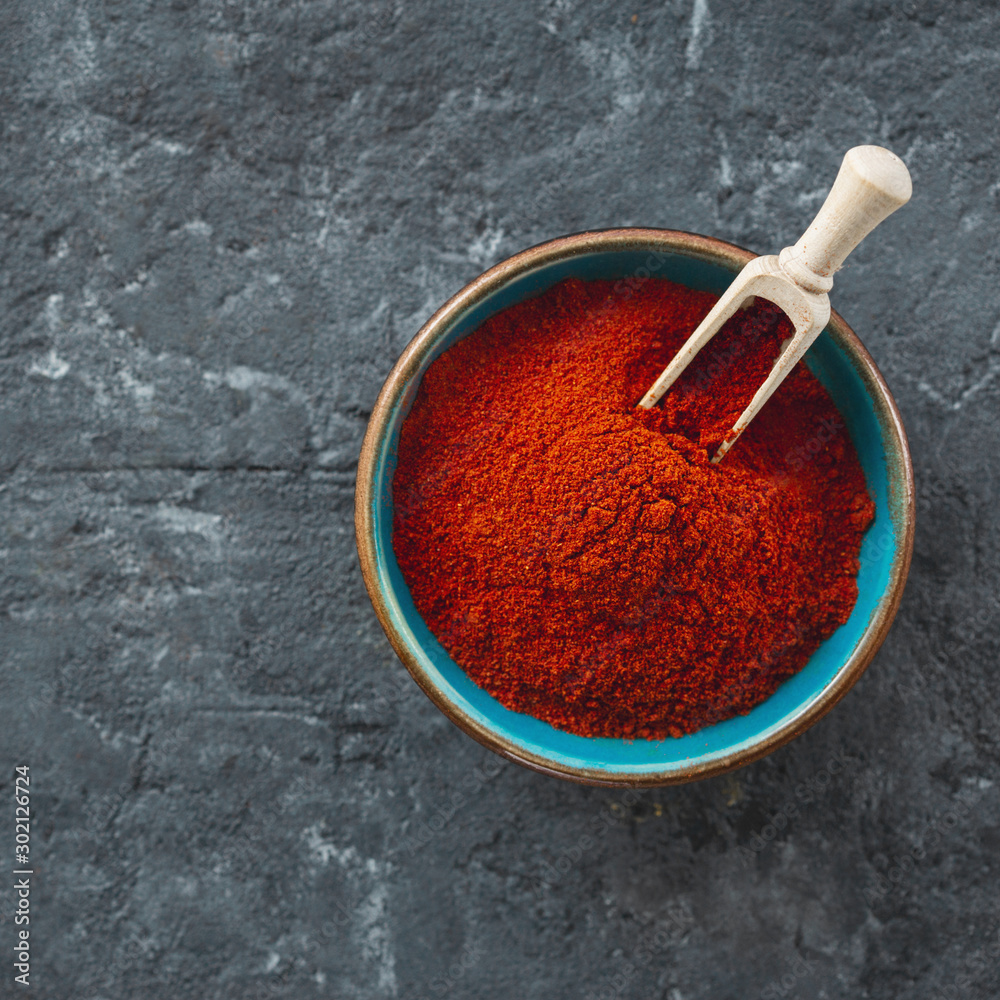 Chili pepper powder on dark background with copy space top view Stock ...