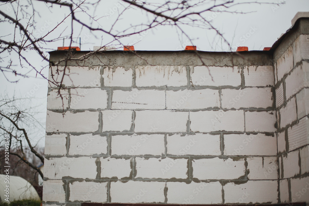 construction of a private cottage house: white gas blocks, aerated ...