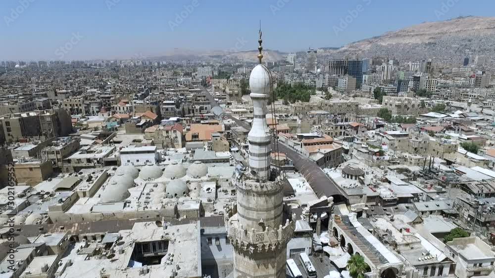 Turning around a minaret of Umayyad Mosque in Old Damascus, Syria ...
