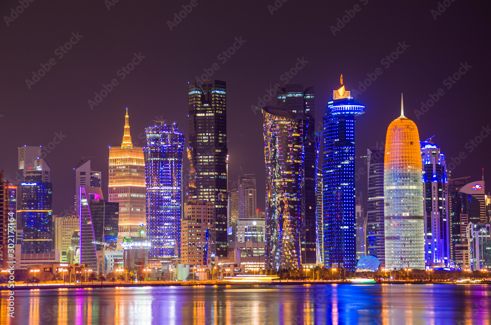 The skyline of the modern and high-rising city of Doha in Qatar, Middle ...