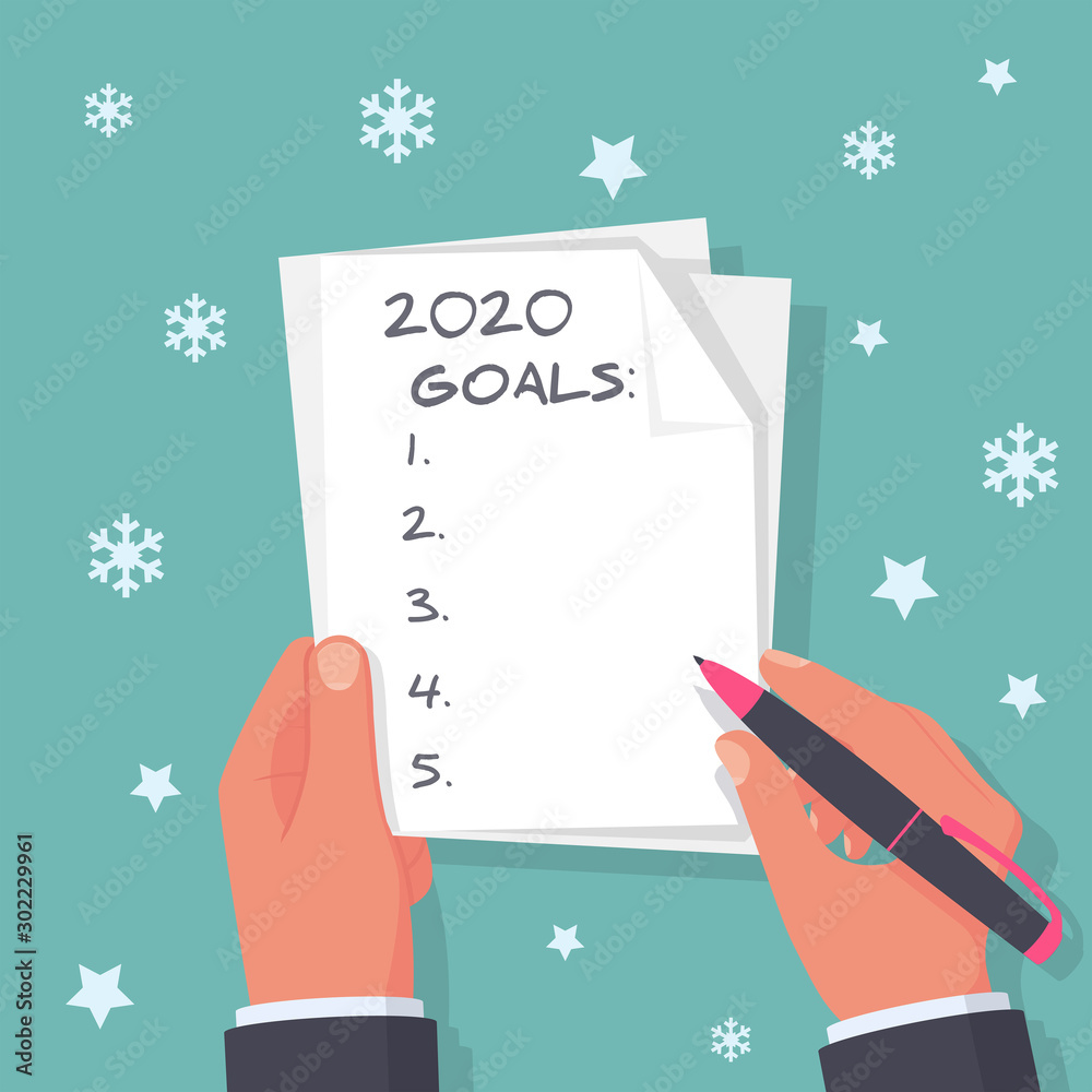 2020 new year goal. Man holds a sheet in hand with a plan for next year ...
