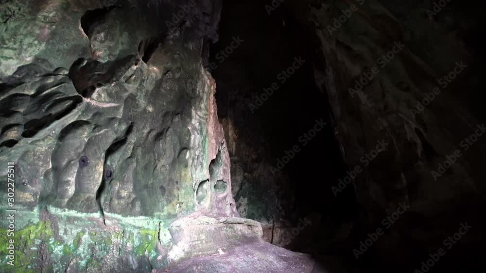 4K, Beautiful natural limestone cave in Malaysia. Entrance to Dark Cave ...