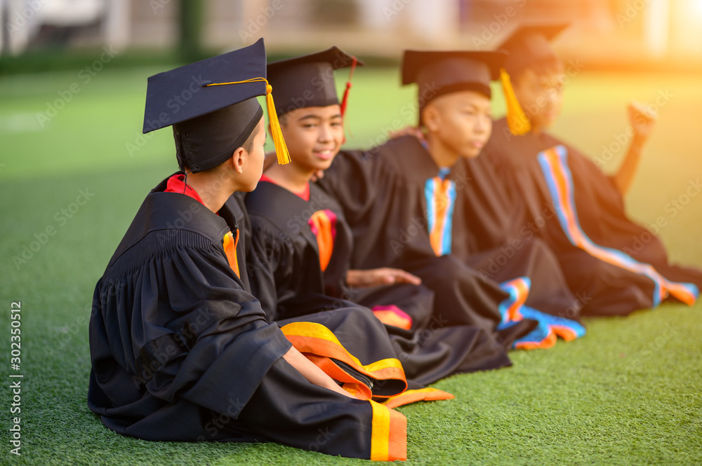 A group of boys are happy on their graduation day at school. Stock ...