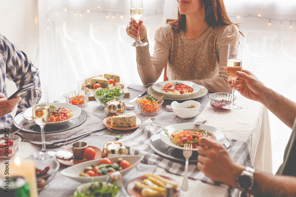 Group of unrecognizable people having a lunch in dining table. Stock ...