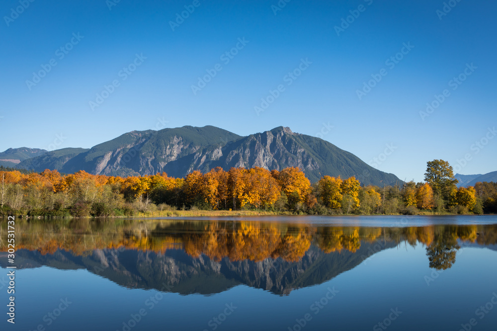 The calm, still waters of a large pond near Snoqualmie, Washington ...