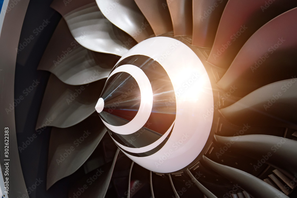 Turbo jet engine of airplane, close up in the light sparkle reflection ...