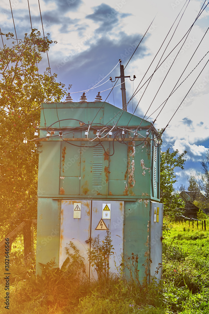 Steel transformer substation with warning signs. Stock Photo | Adobe Stock