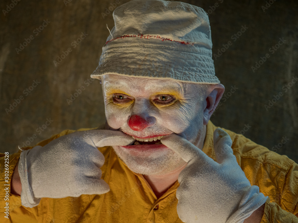 Crazy aggressive clown. man hates his work and in his free time dresses ...