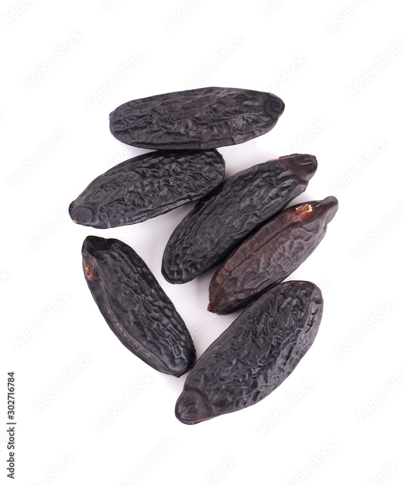 Tonka beans isolated on white background. Bean of Dipteryx odorata ...
