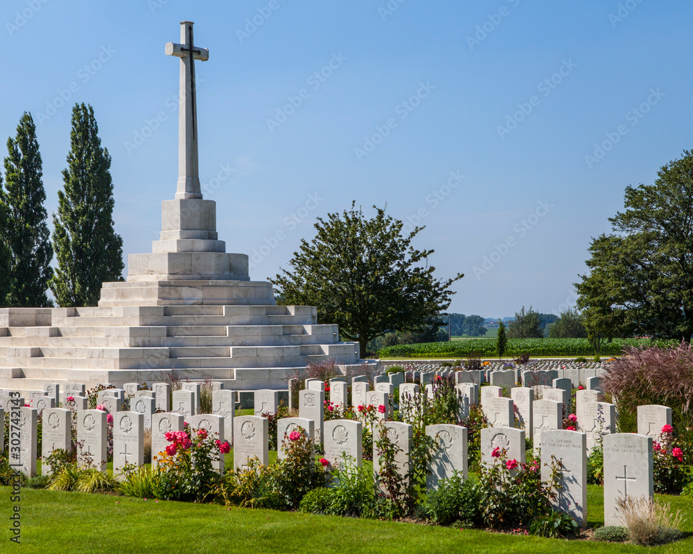 War Graves and the Cross of Sacrifice at Tyne Cot Cemetery in Belgium ...