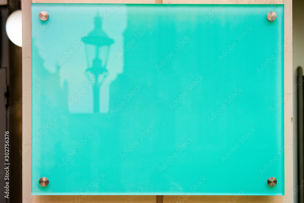 Blank Street plate on building wall in Vienna, Austria. Empty name sign ...