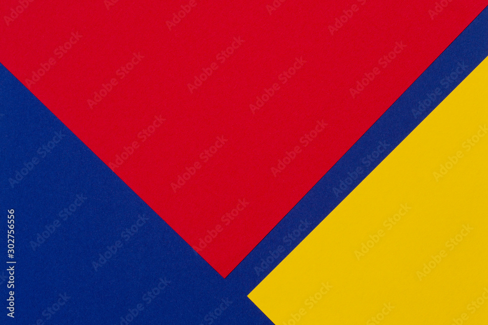 Abstract blue, red and yellow color paper geometry composition ...