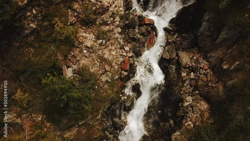 Tilt shot of wild water stream in mountains in France Stock Video ...