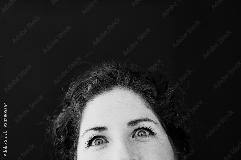 Funny eyes. Black and white "Kilroy" humor photo of woman. Stock Photo ...