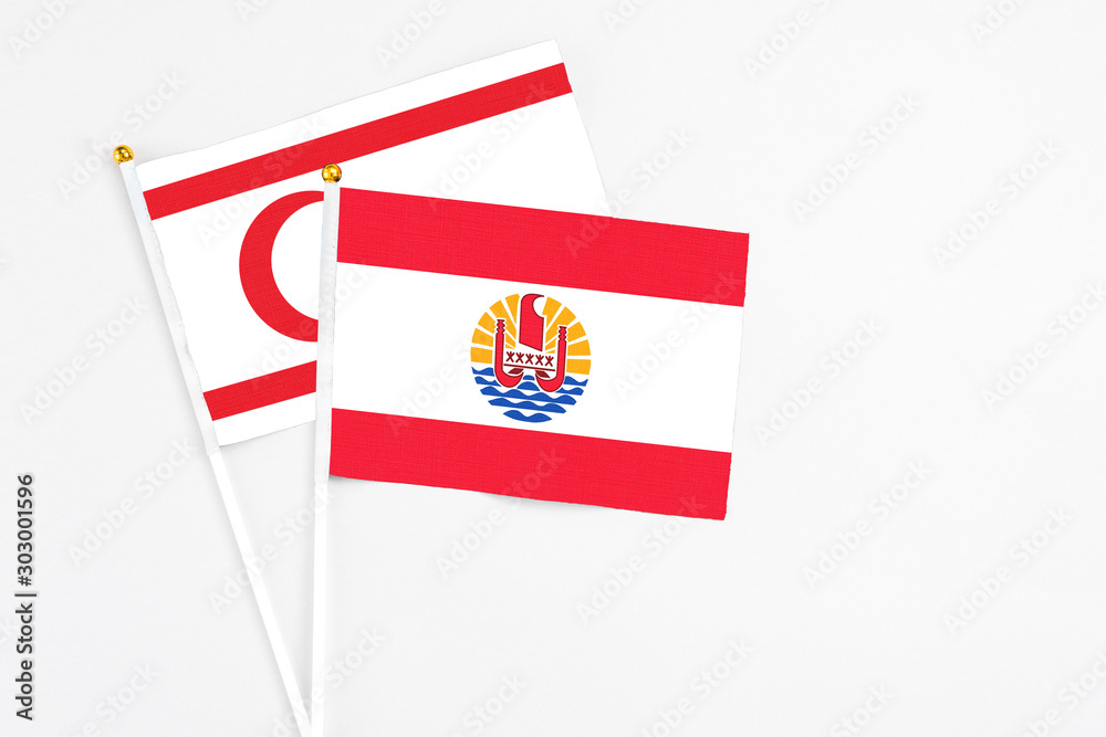 French Polynesia and Northern Cyprus stick flags on white background ...