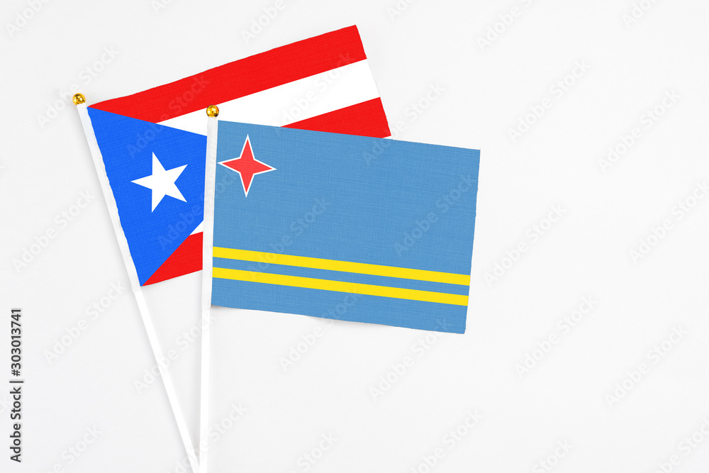 Aruba and Puerto Rico stick flags on white background. High quality ...