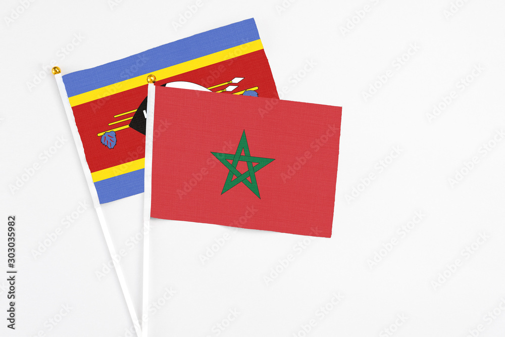 Morocco and Swaziland stick flags on white background. High quality ...