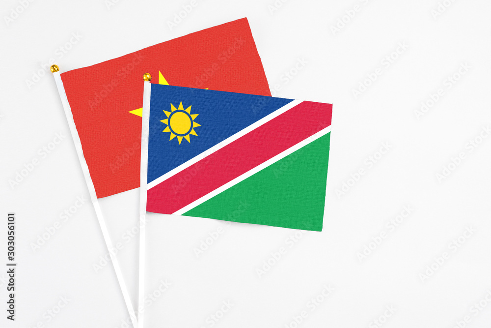 Namibia and Vietnam stick flags on white background. High quality ...