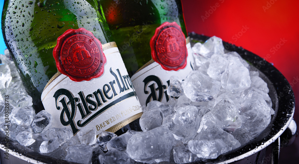 Bottles of Pilsner Urquell beer in bucket with crushed ice Stock Photo ...