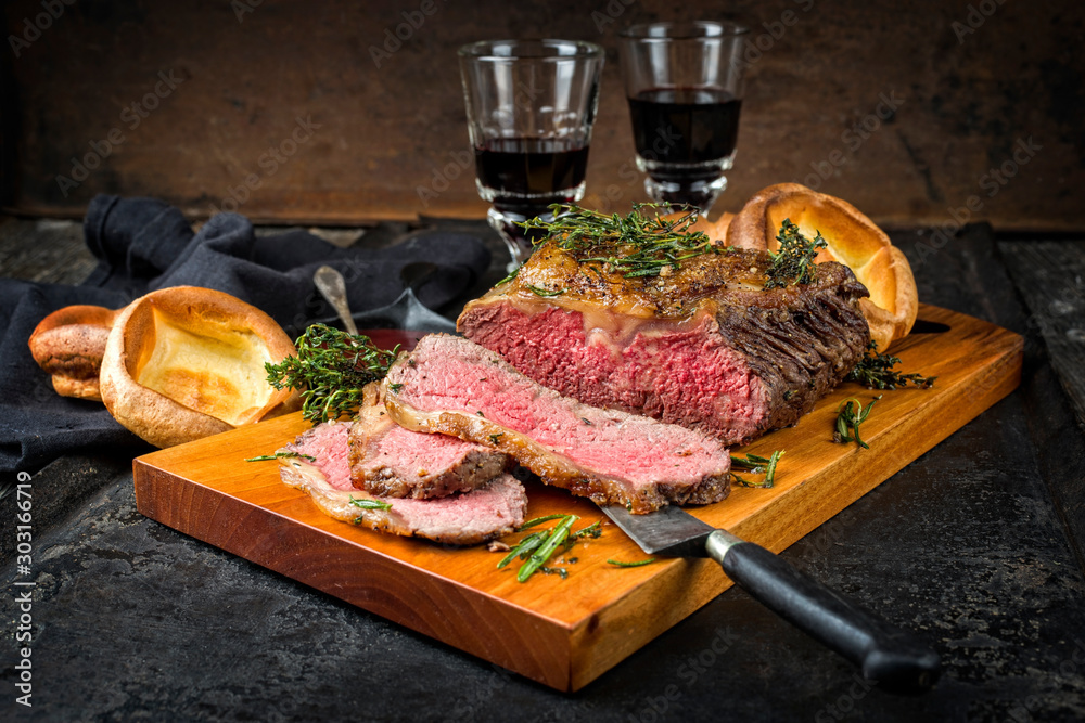 Traditional Commonwealth Sunday roast with sliced cold cuts roast beef ...