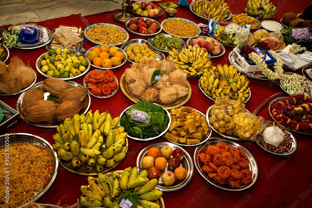 wedding venue filled with fruits sweets and dresses for the traditional ...