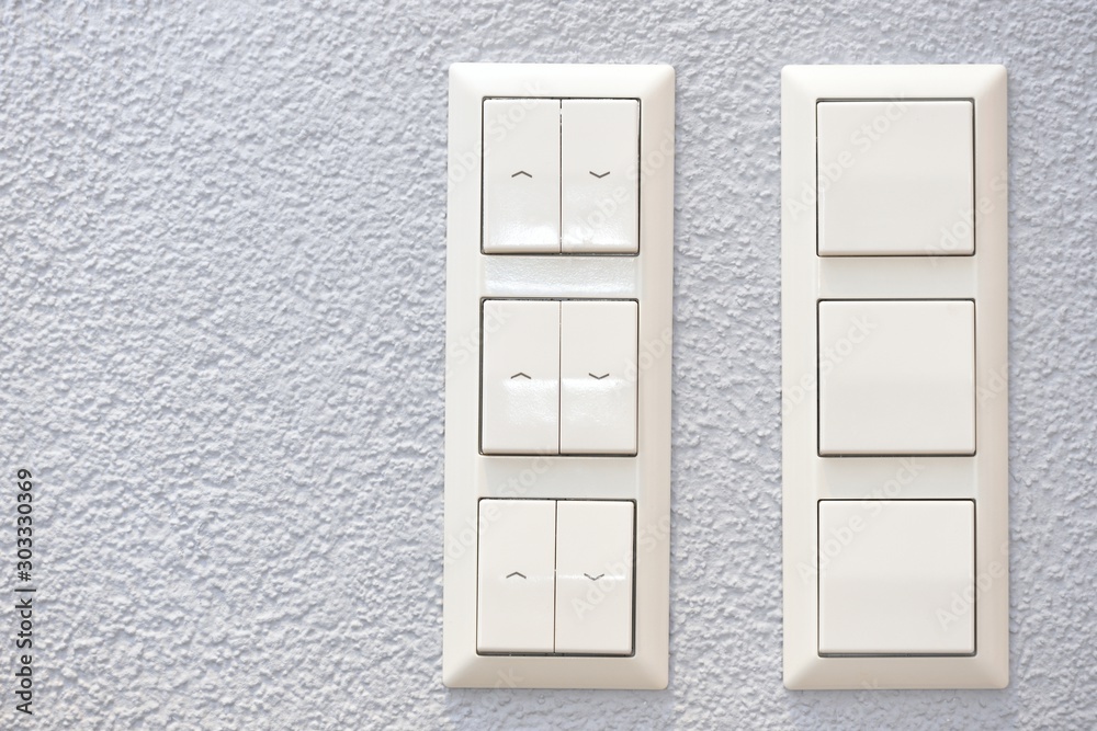 Wall-mounted light switches and roller shutter control switch on ...