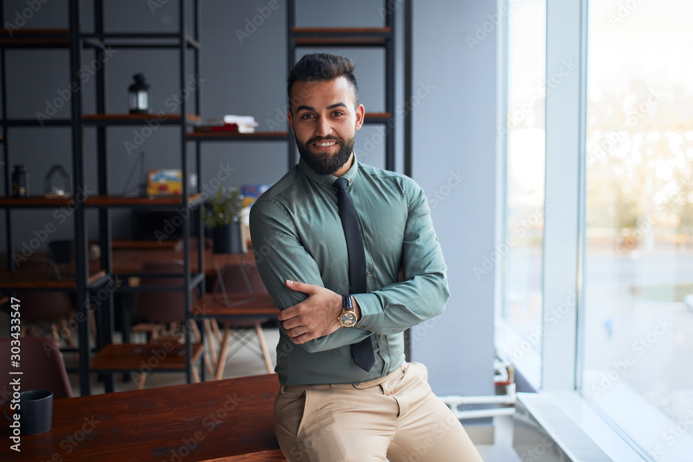 Good-looking personable young man from middle east, businessman ...